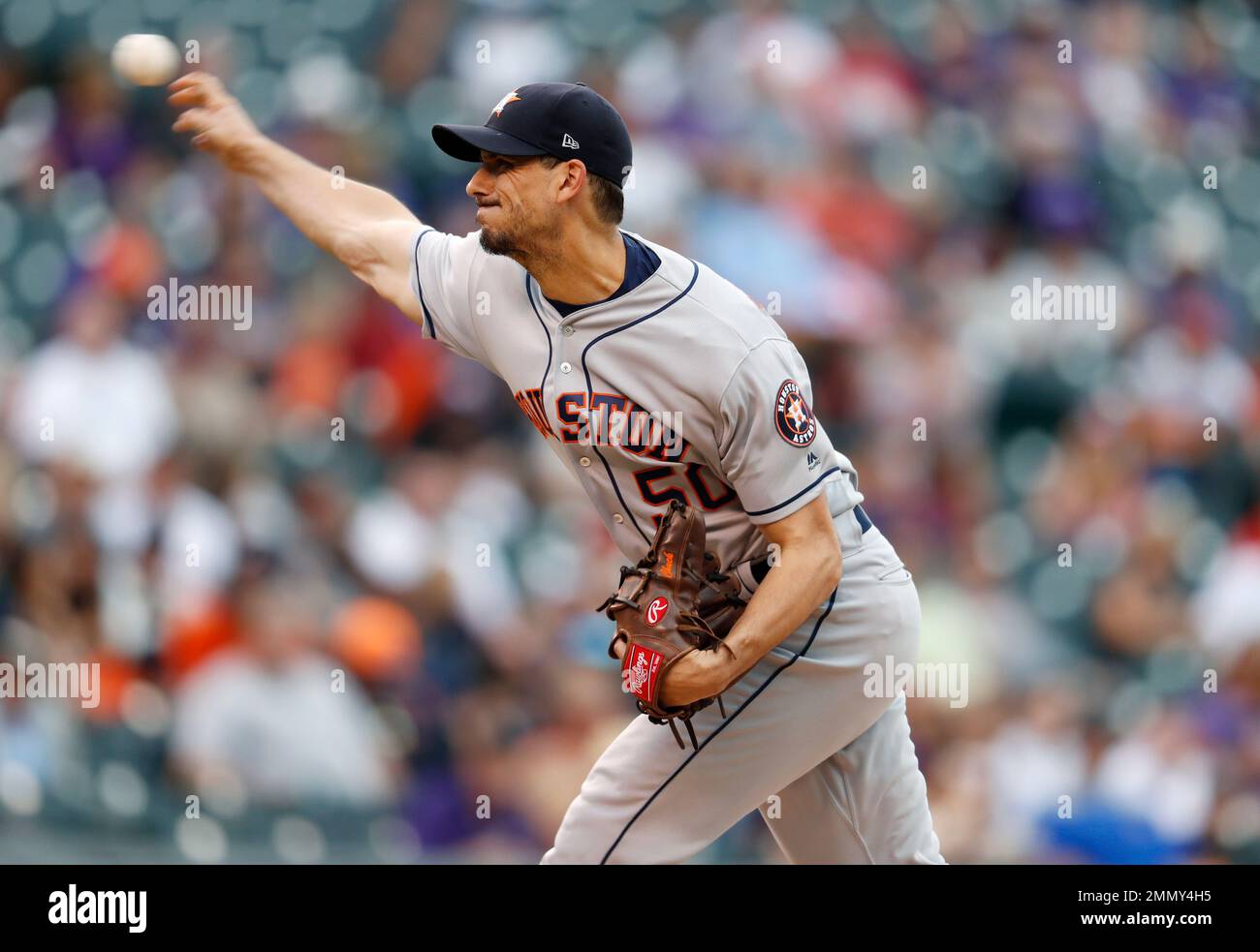 Houston Astros starting pitcher Charlie Morton throws to a Colorado ...