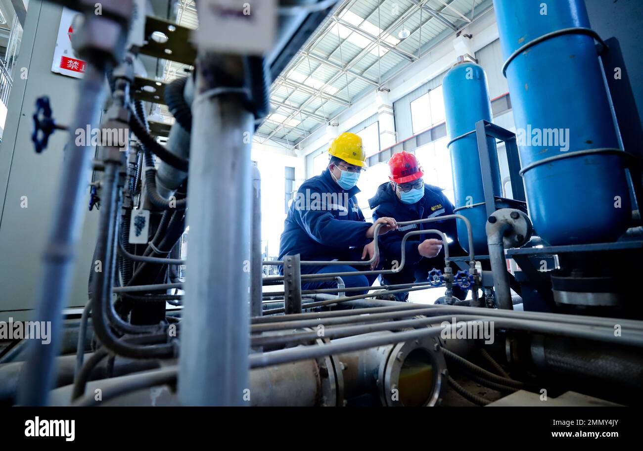 ZHANGYE, CHINA - JANUARY 29, 2023 - Staff members pay close attention ...