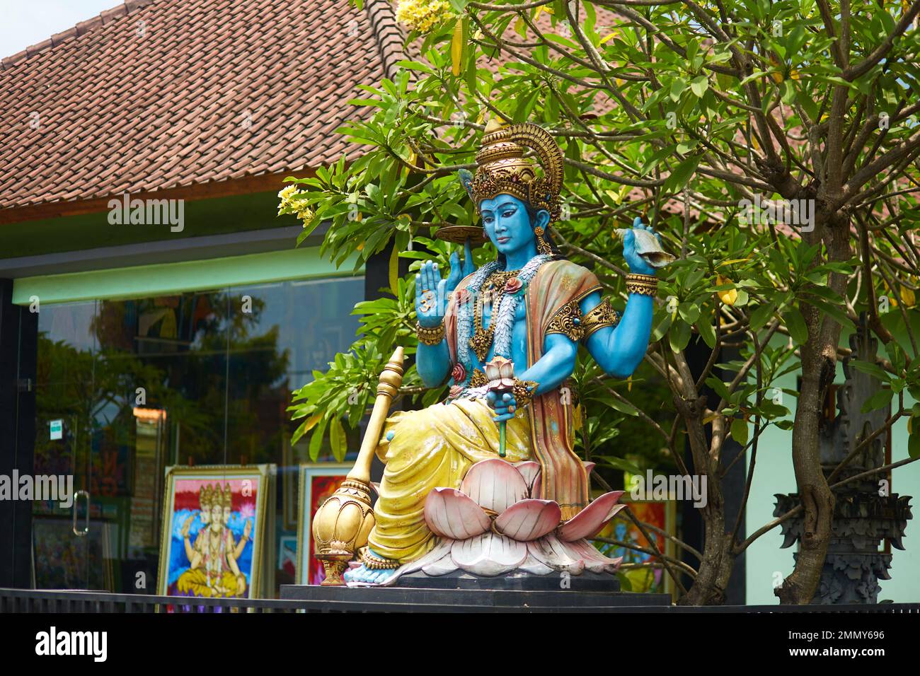 A sculpture of a blue multi-armed shiva. Gods of Indo-Buddhism on the ...