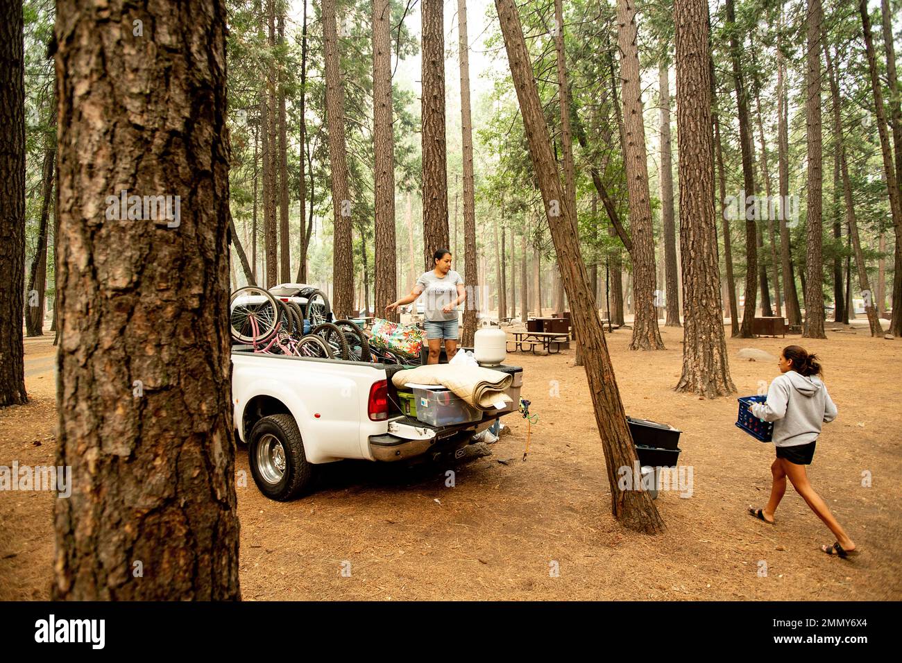 Lisa Salgado and daughter Alyssa, 19, break camp at the Upper Pines ...