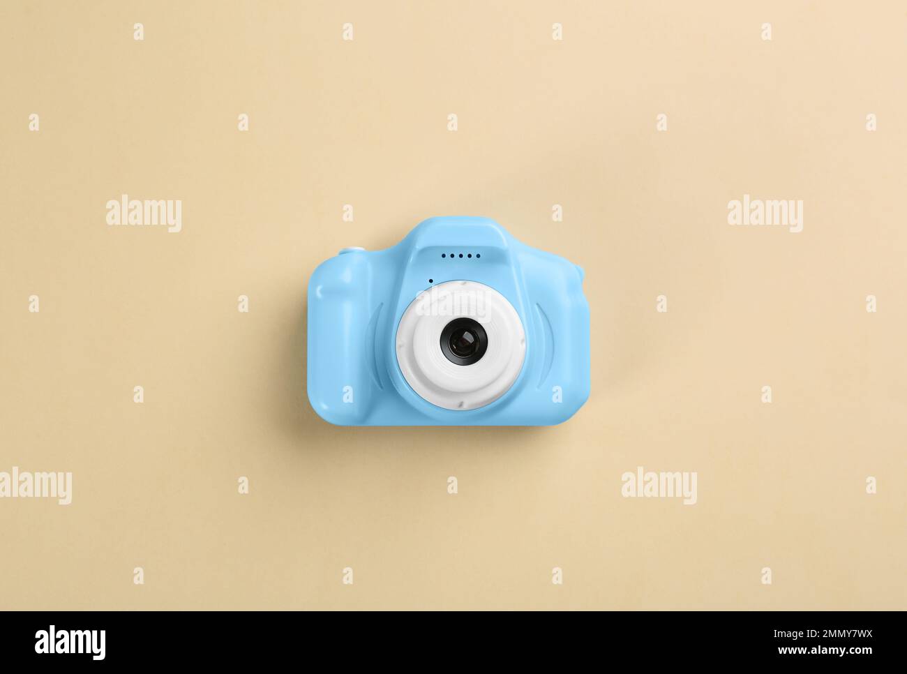 Light blue toy camera on beige background, top view Stock Photo - Alamy