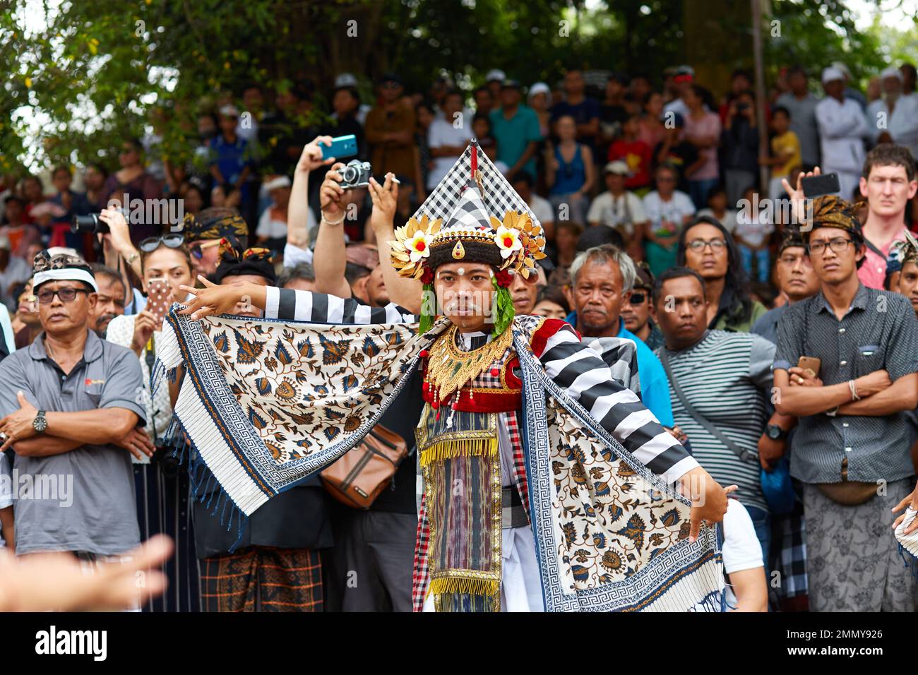 Cremation ceremony in Bali. Portrait of a dancer performing a ritual ...