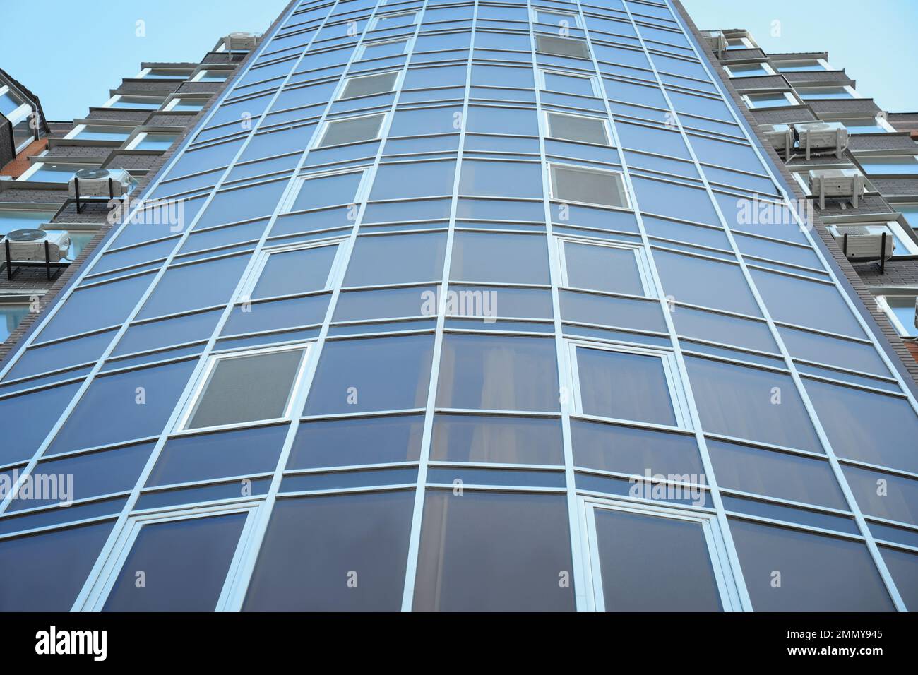 New modern building with tinted windows outdoors Stock Photo - Alamy