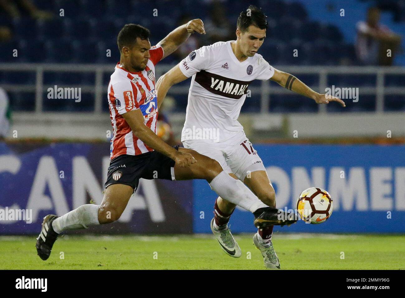 German Gutierrez, of Colombia's Junior, , left, and Gonzalo Di Renzo ...