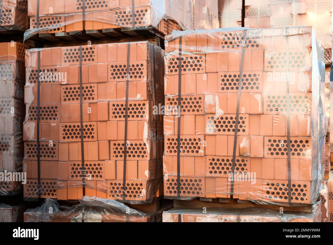 Pile pallets red bricks hi-res stock photography and images - Alamy