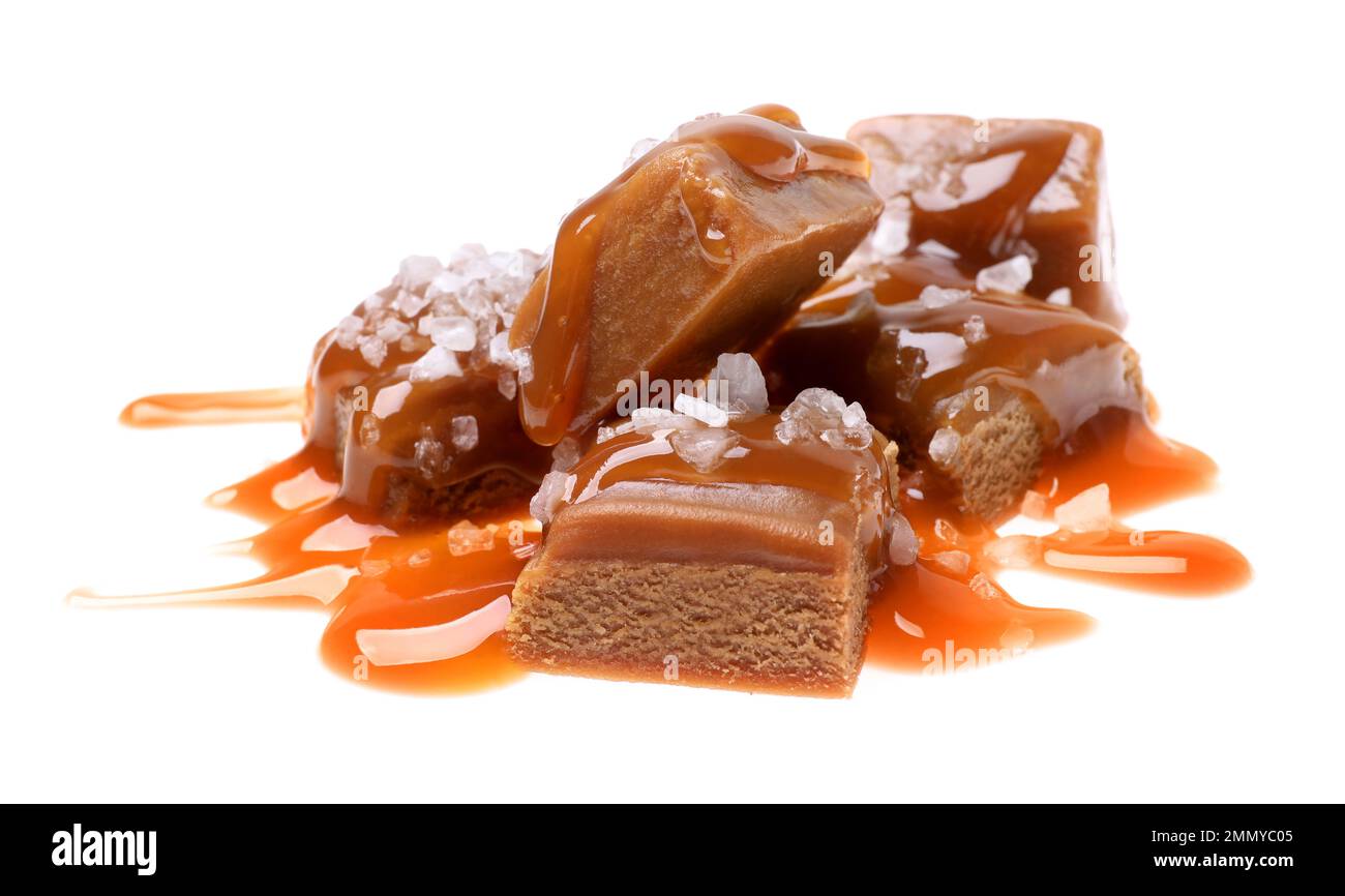 Delicious salted caramel with sauce on white background Stock Photo - Alamy