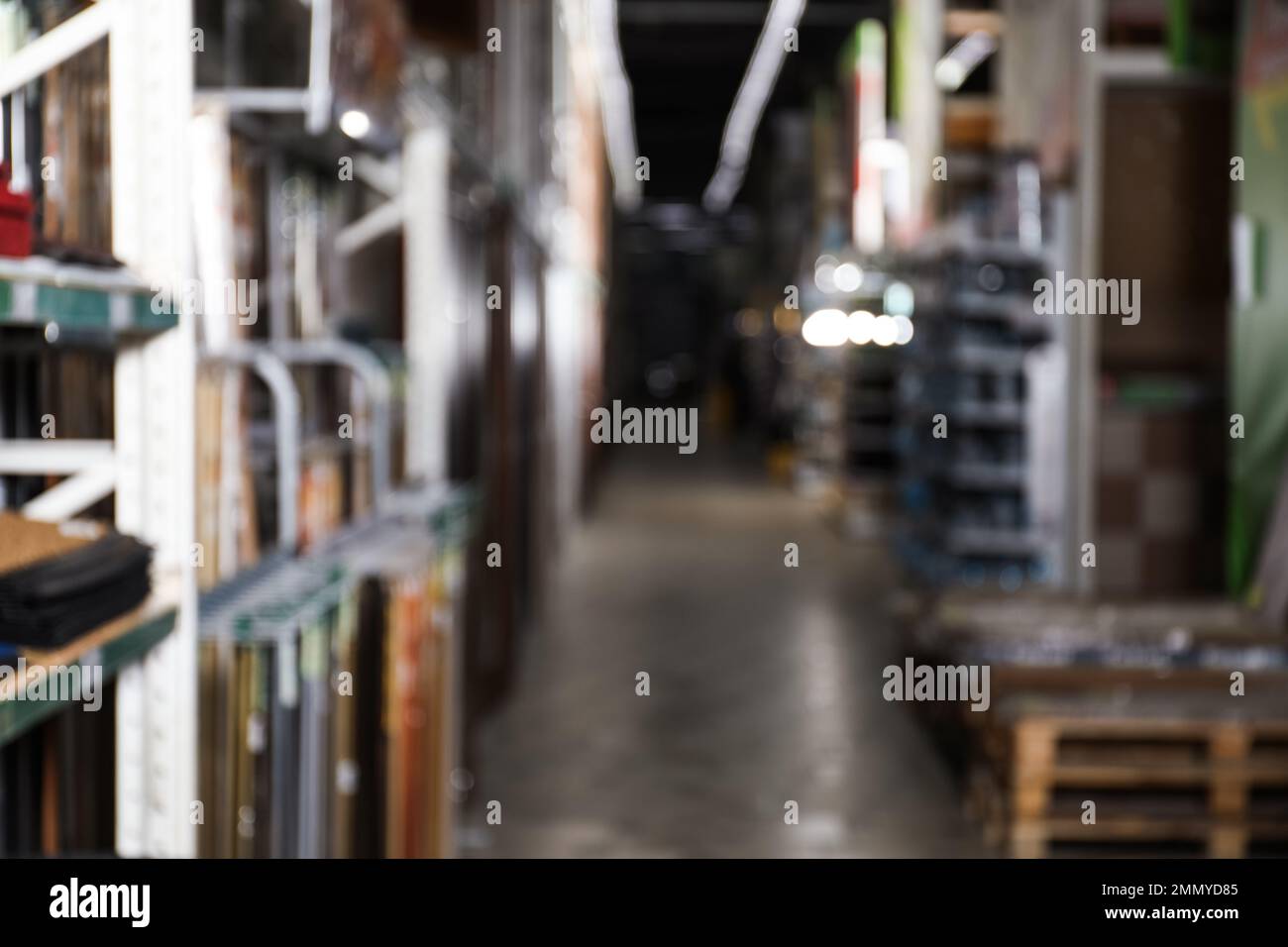Blurred warehouse aisle building hi-res stock photography and images ...