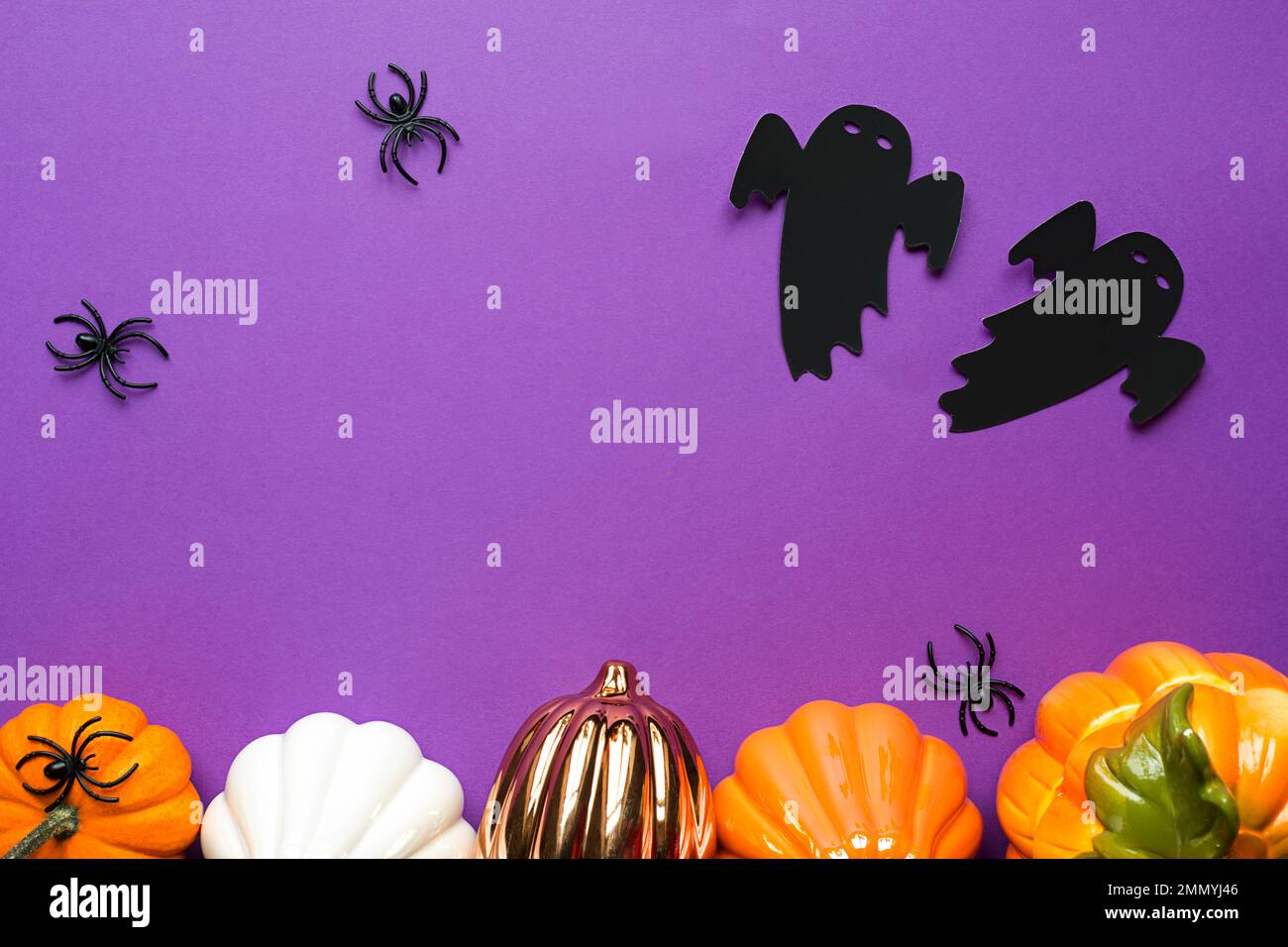 Halloween backgrounds of white, orange and gold pumpkins, spiders and ...