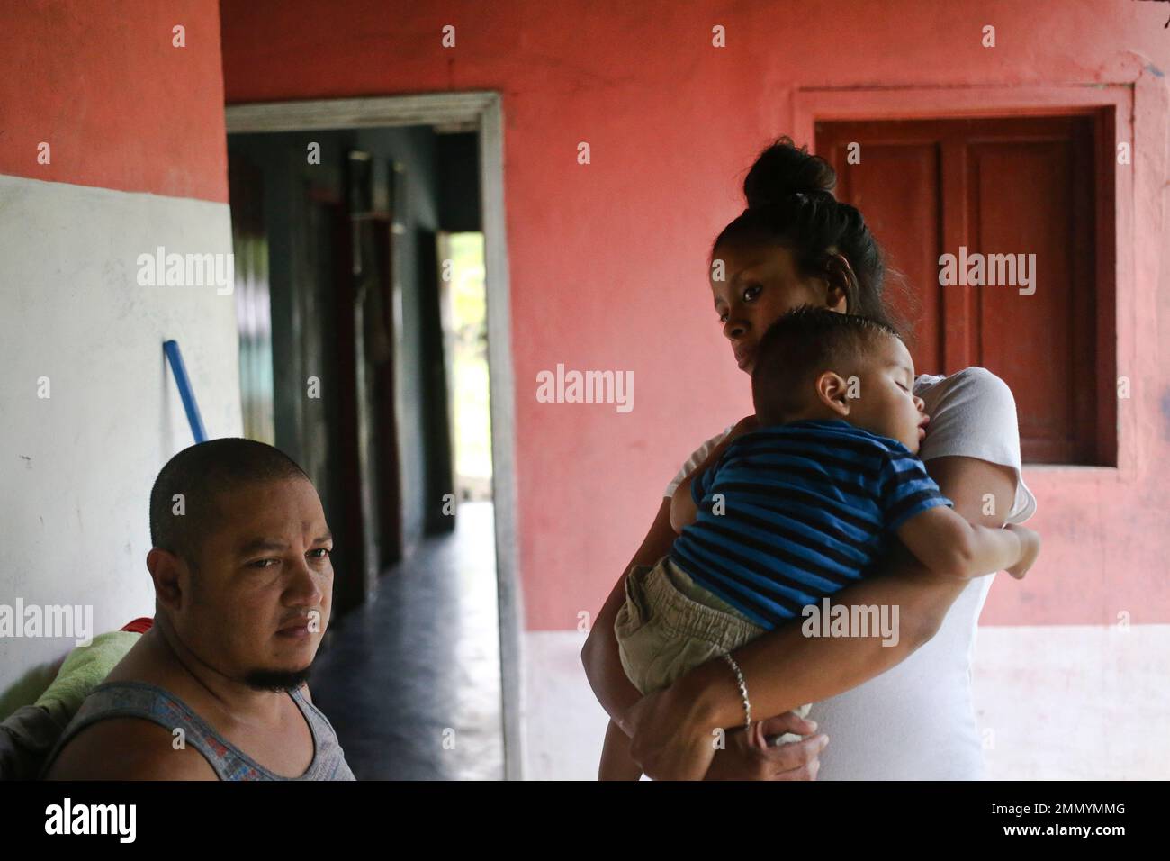 Adalicia Montecinos cradles her year-old son Johan, who became a poster ...