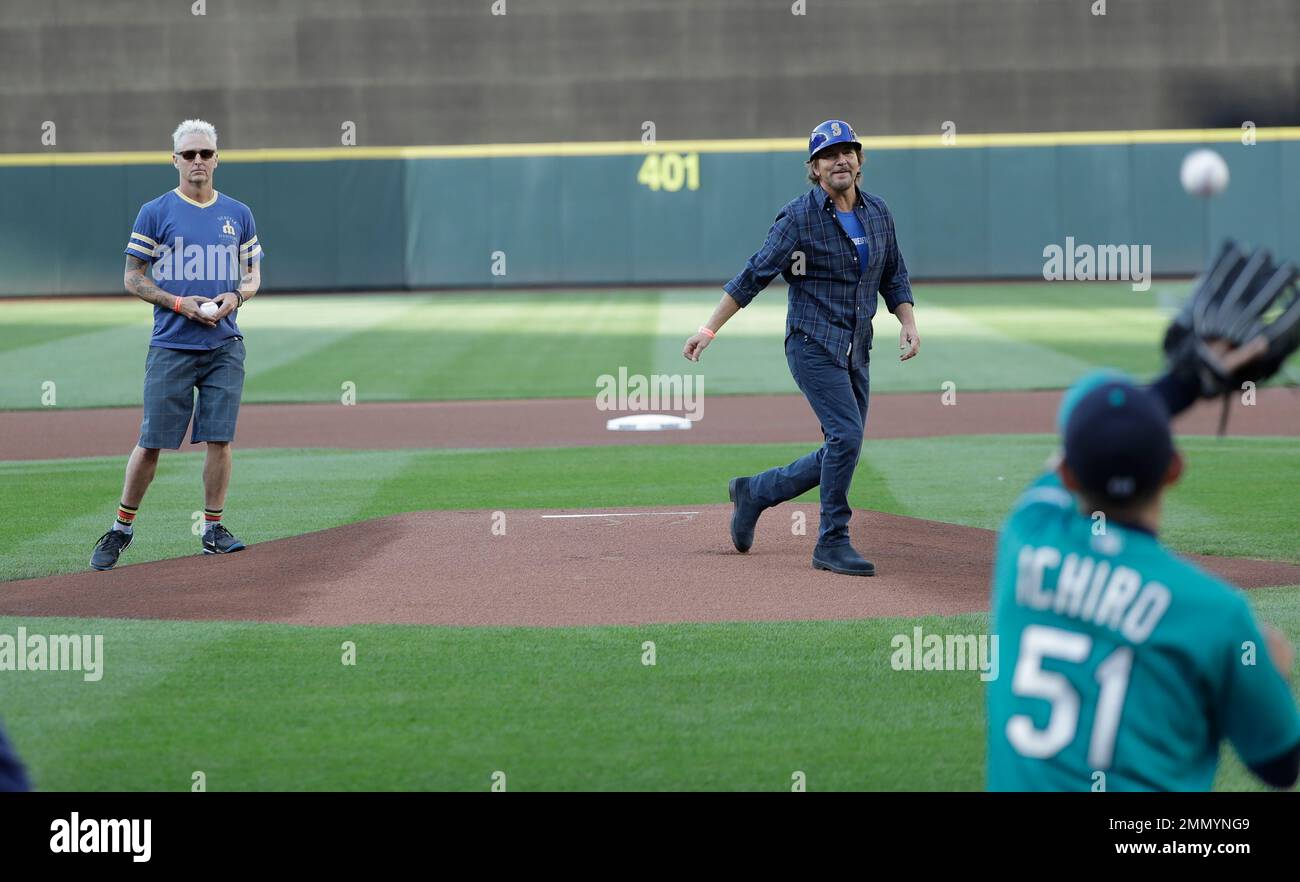 Eddie Vedder, upper right, lead singer of the rock band Pearl Jam, and ...