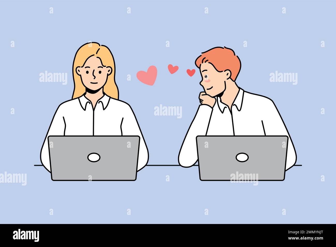 Young Man In Love Look At Female Colleague Working Together At Laptops