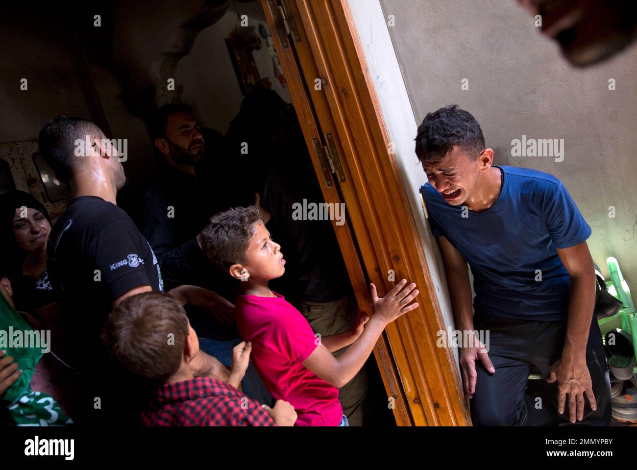 A Palestinian relative of Mohammed Badwan, 27, who was shot and killed ...