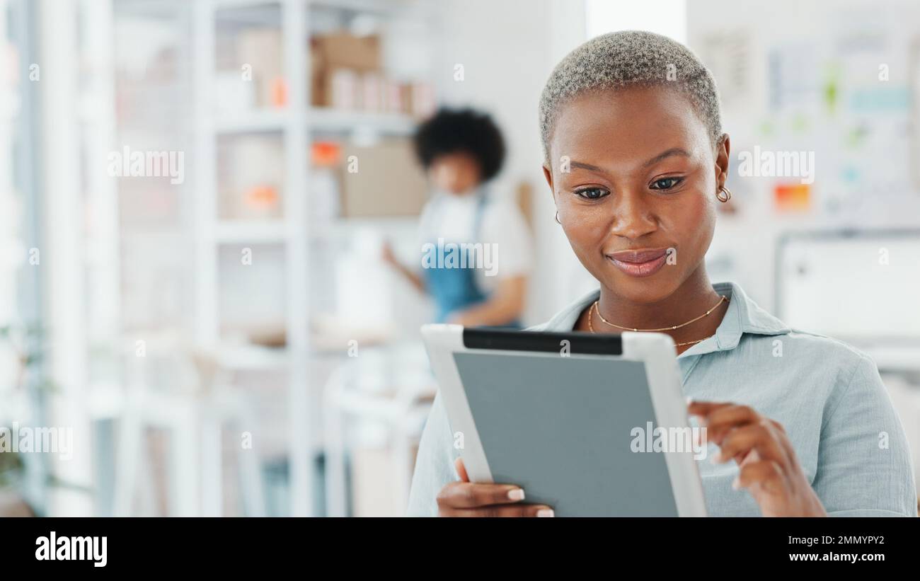 Woman entrepreneur, small business and tablet logistics planning for ...