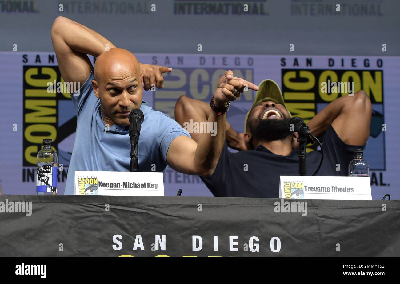 Keegan-Michael Key, left, points to the crowd as Trevante Rhodes laughs ...
