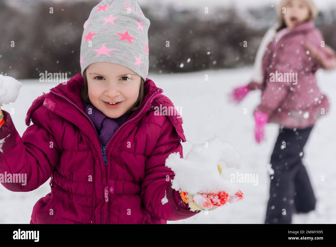 Snowball child throwing hi-res stock photography and images - Alamy