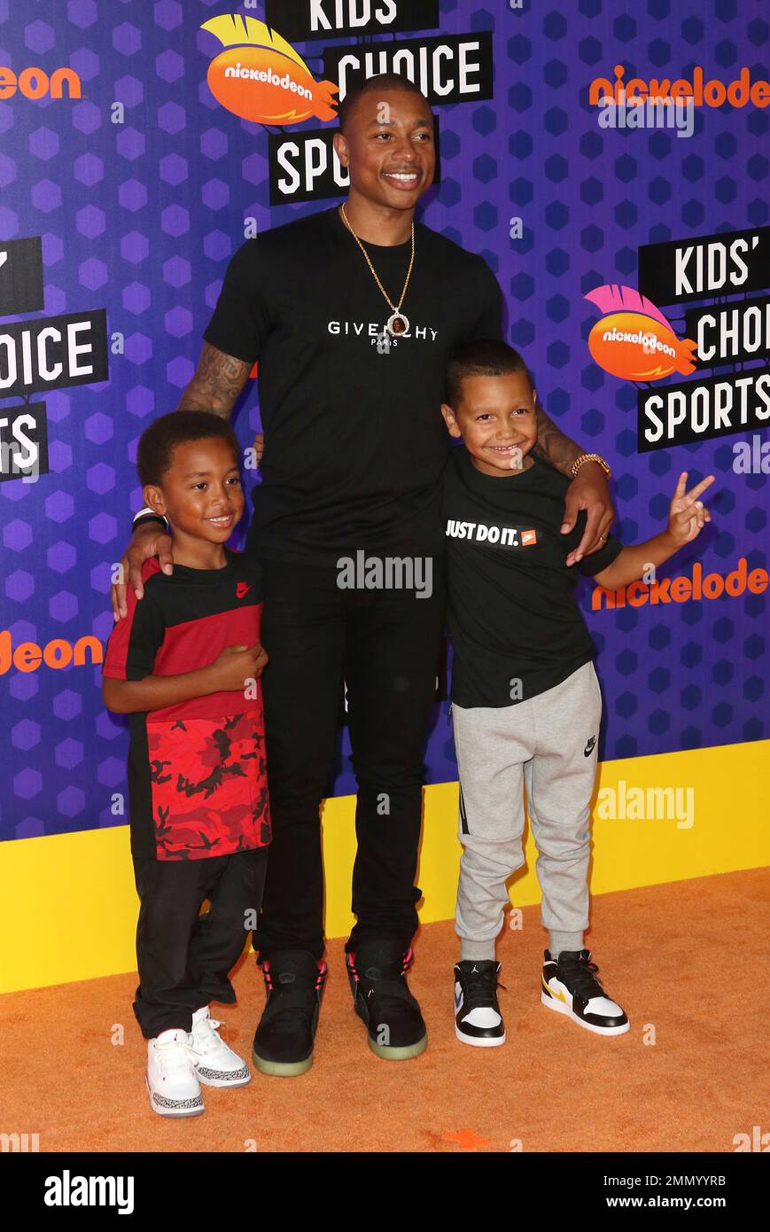 NBA basketball player Isaiah Thomas, of the Denver Nuggets, center ...