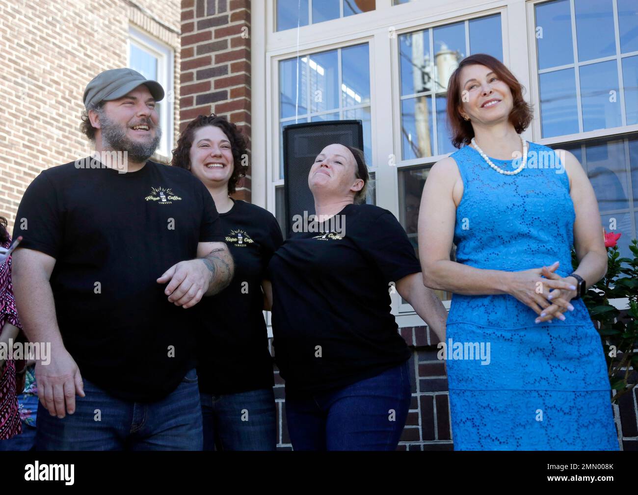 Lisa Scheller, right, stands with baristas, from left, Steve Schickram ...