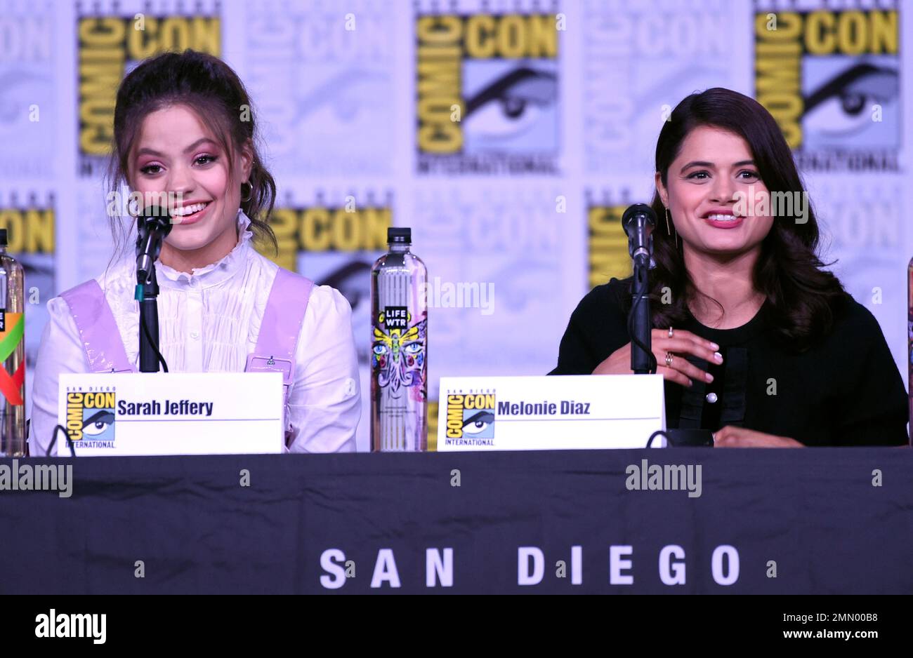 Sarah Jeffery, left, and Melonie Diaz attend the "Charmed" panel on day ...