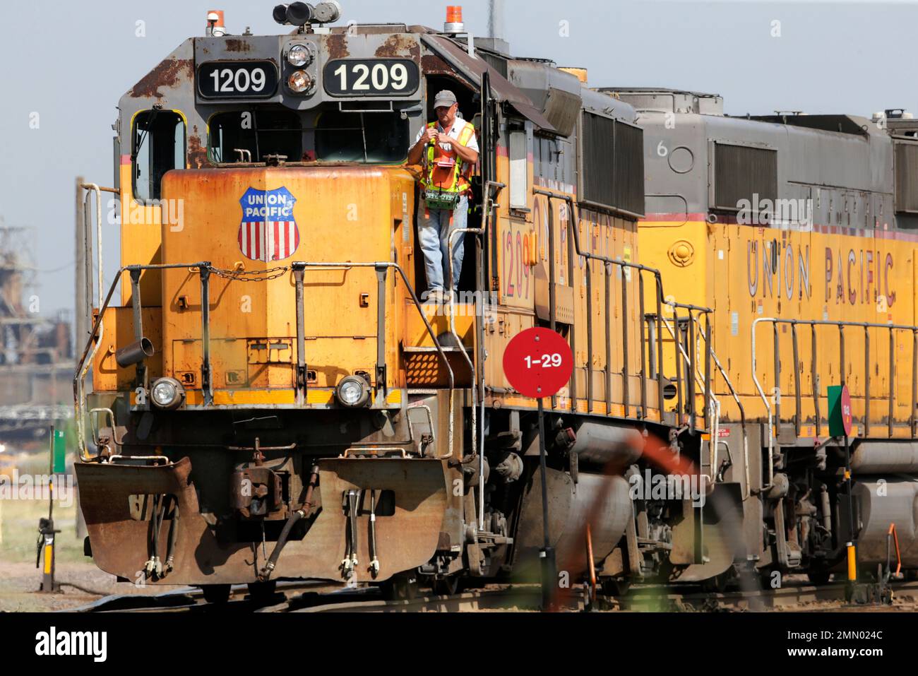 FILE- In this July 20, 2017, photo, a Union Pacific employee is seen on ...