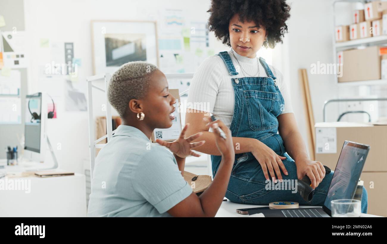 Warehouse, logistics and teamwork black women on laptop talking ...