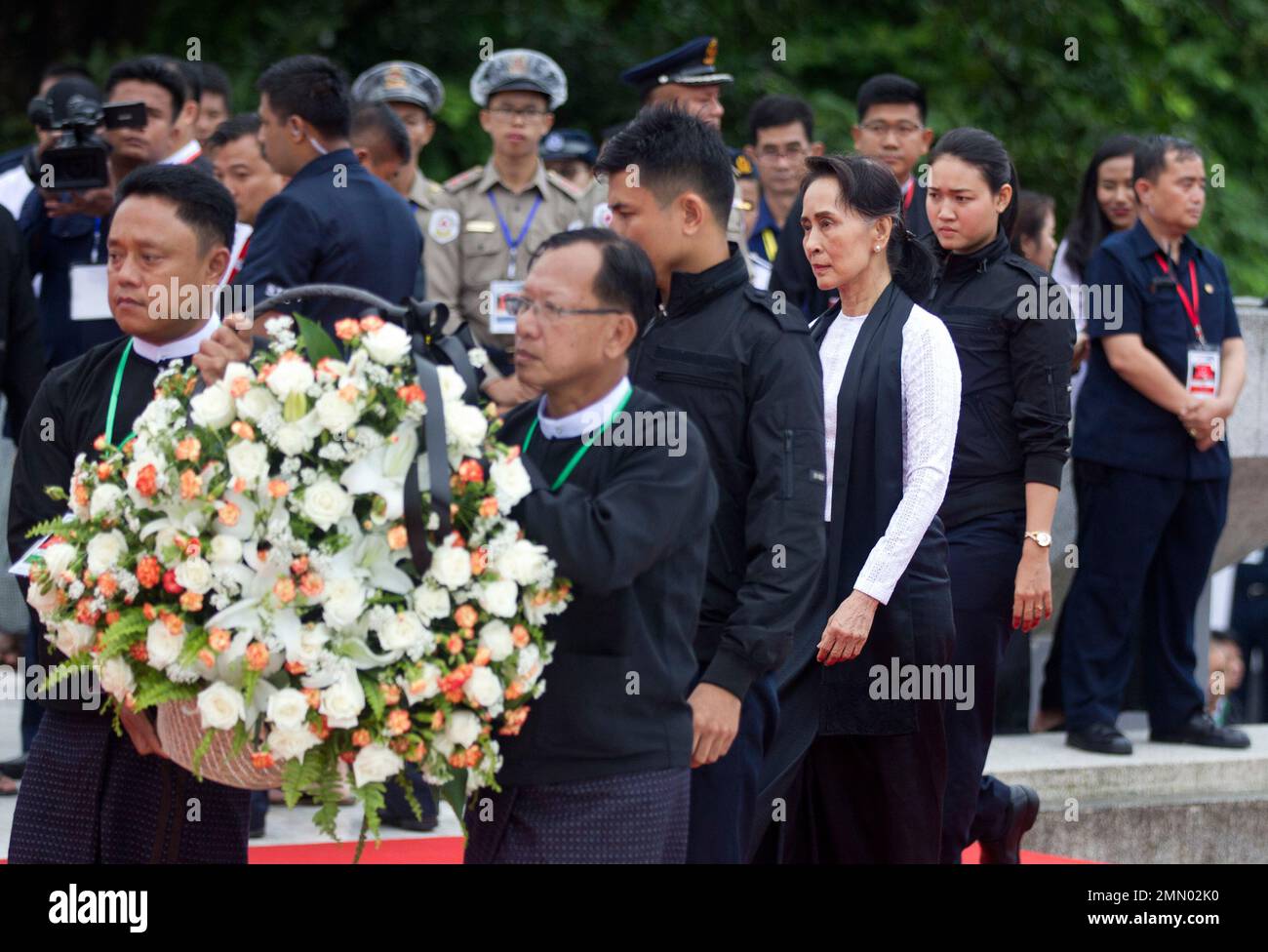 Myanmar leader Aung San Suu Kyi arrives to lay flower basket at the ...