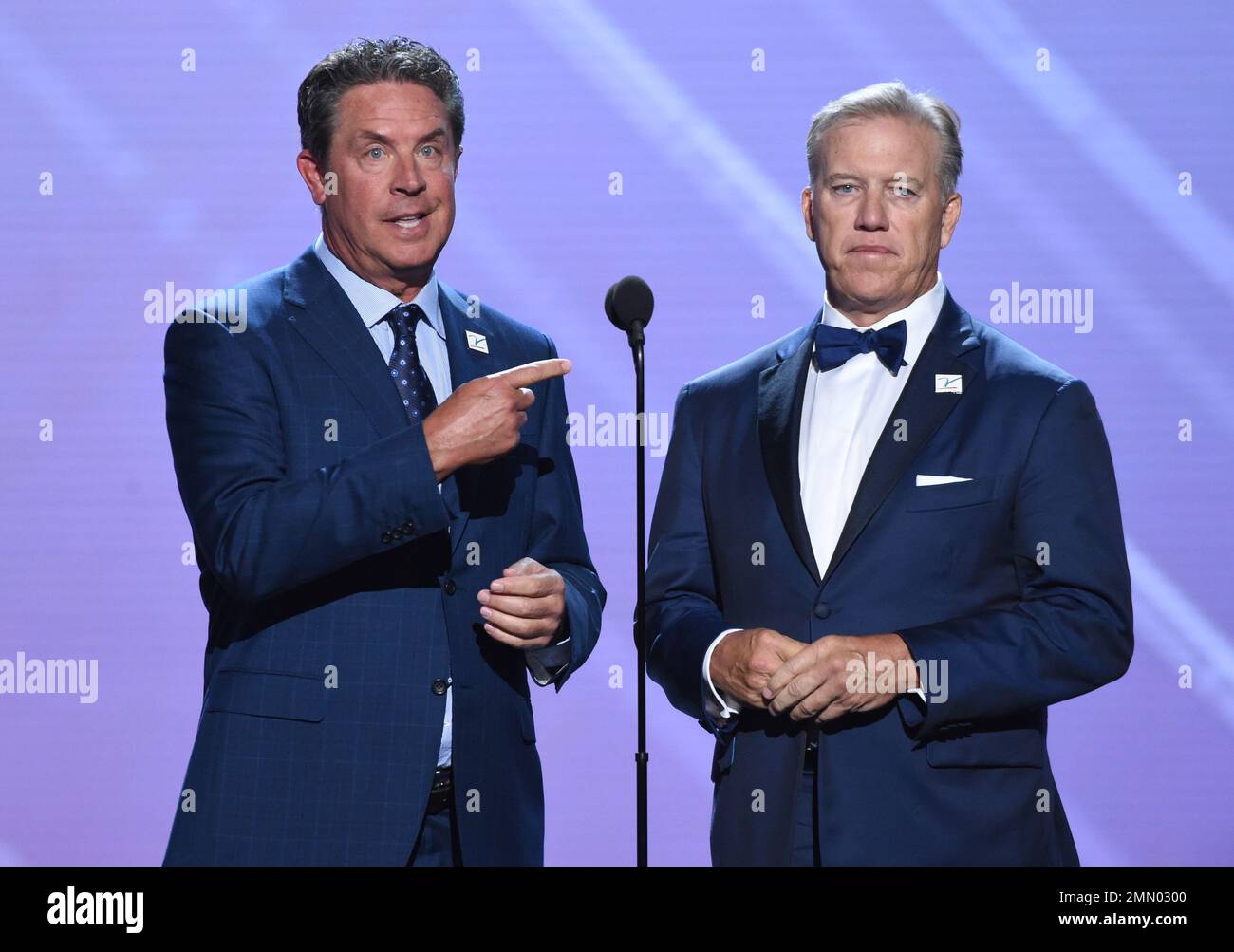 John Elway, right, and Dan Marino present the Jimmy V award for ...