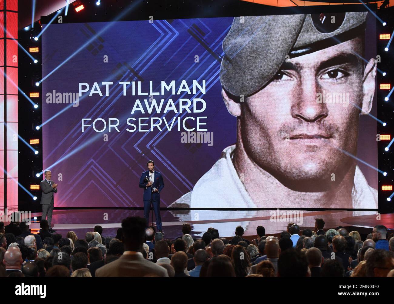 Former Marine Sgt. Jake Wood accepts the Pat Tillman award for service ...