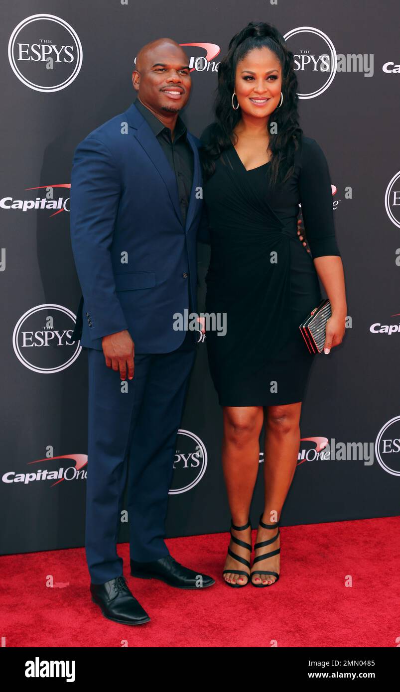 Former NFL football player Curtis Conway, left, and wife, former ...