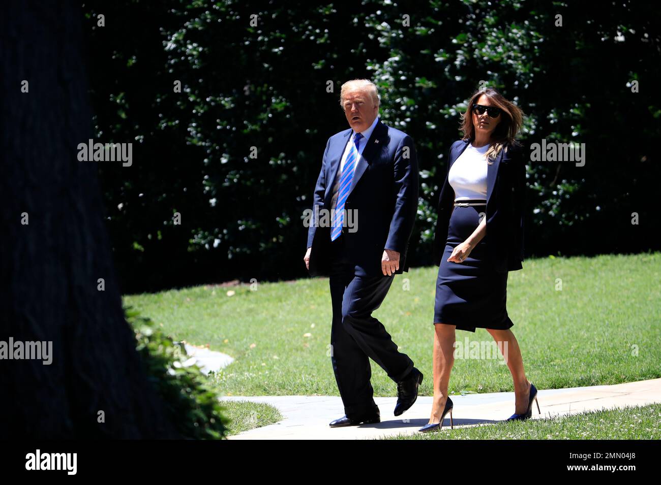 President Donald Trump and first lady Melania Trump, leave the White ...