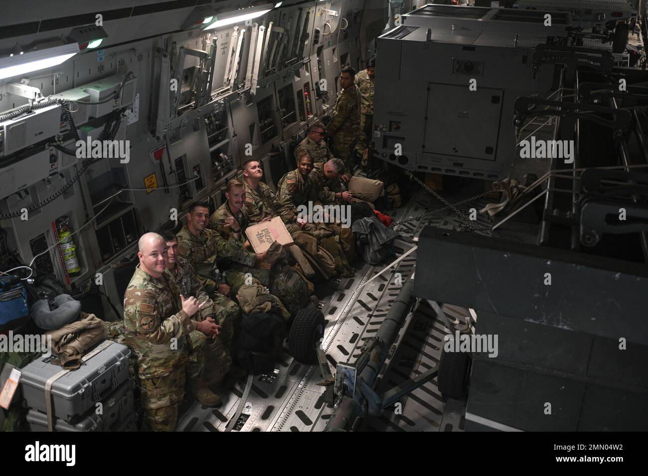 U.S. Air Force Airmen prepare for takeoff for their deployment to the U ...