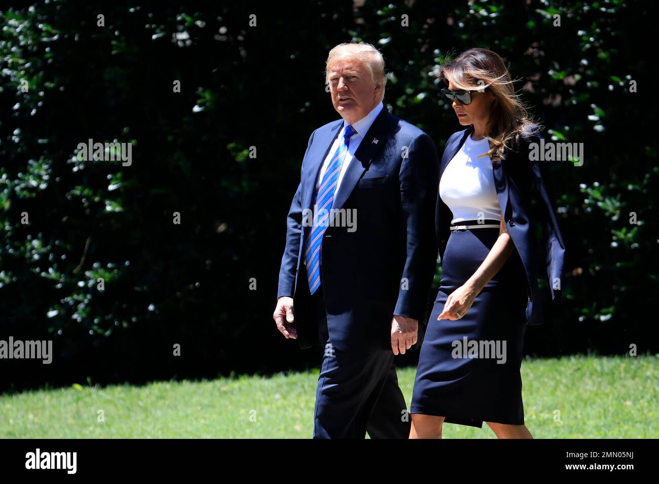 President Donald Trump and first lady Melania Trump, leave the White ...