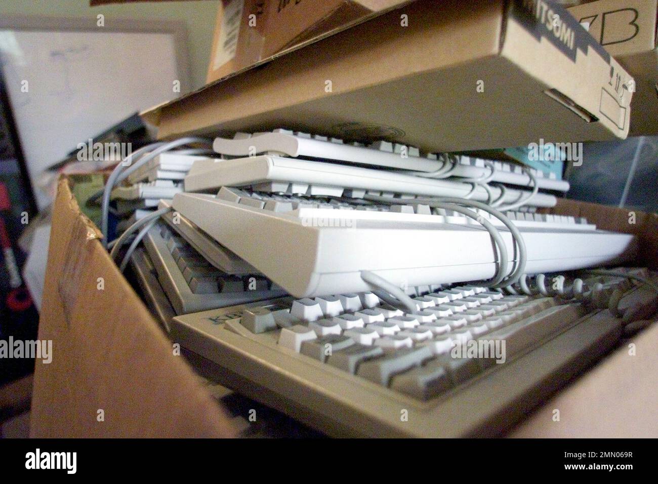 A stack of keyboards piled into a box are on display at the bankrupt ...