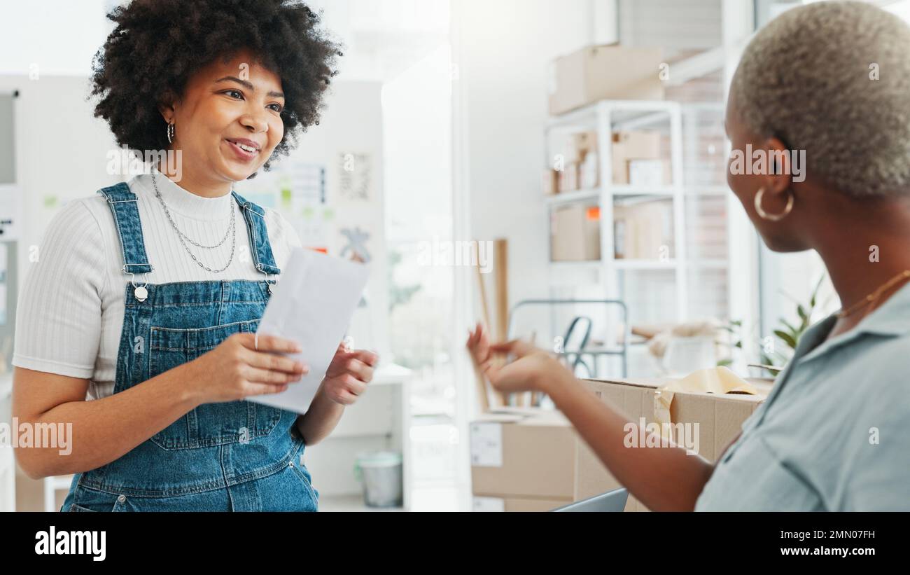 Women, envelope and smile with handshake in deal at studio or business ...