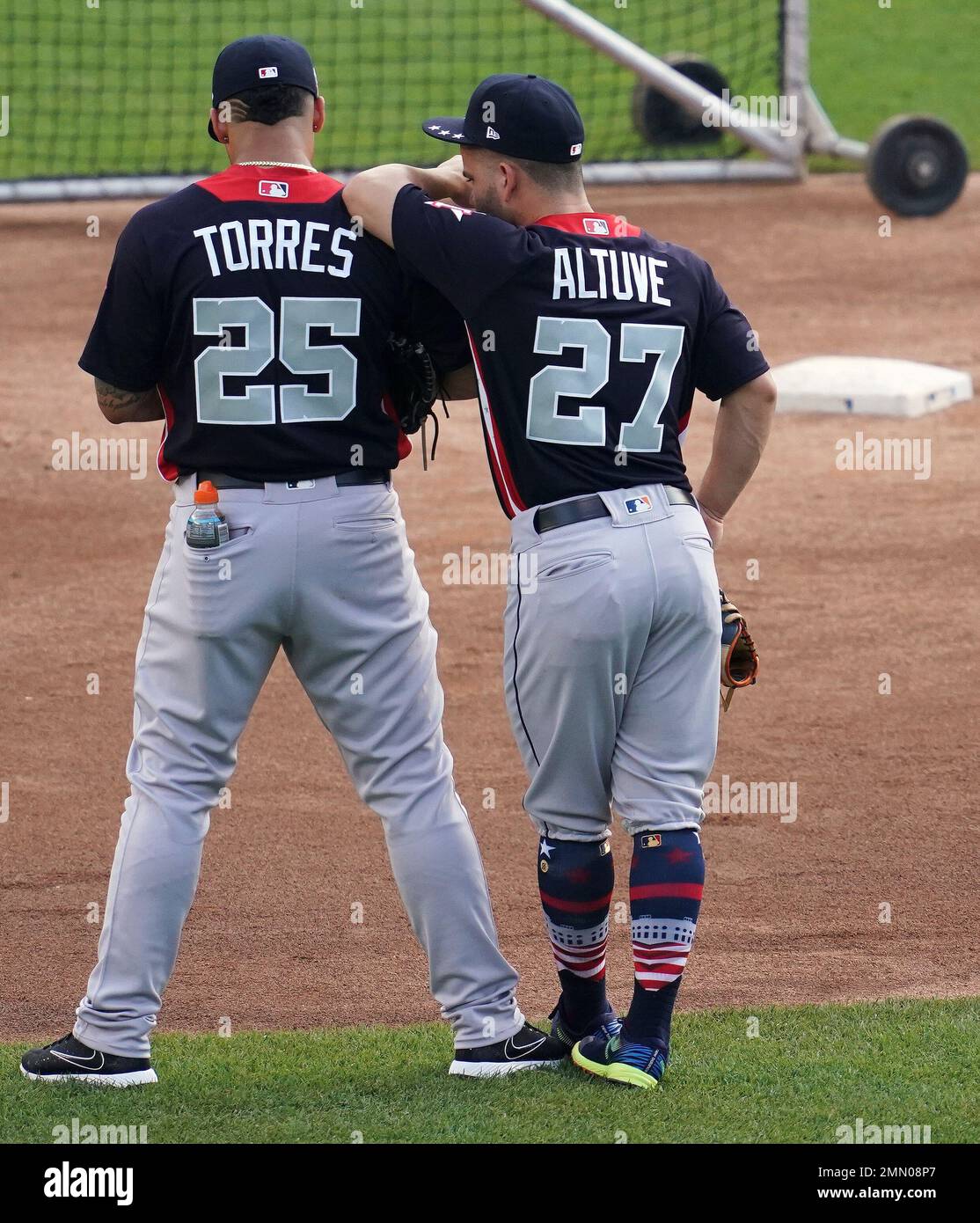 New York Yankees second baseman Gleyber Torres, left and Houston Astros ...