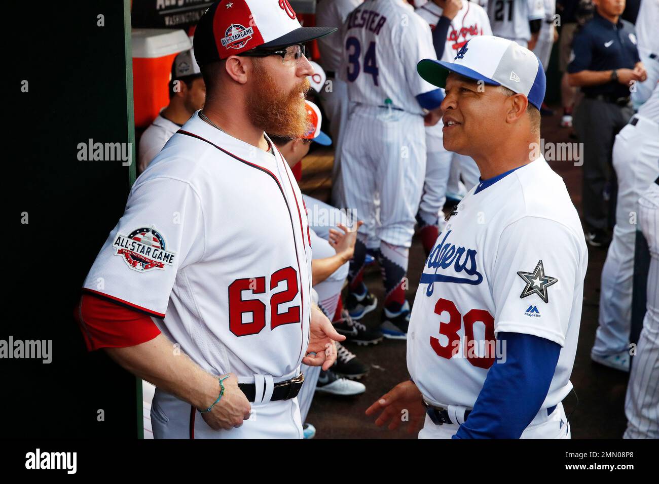 Washington Nationals pitcher Sean Doolittle, left, speaks with National ...
