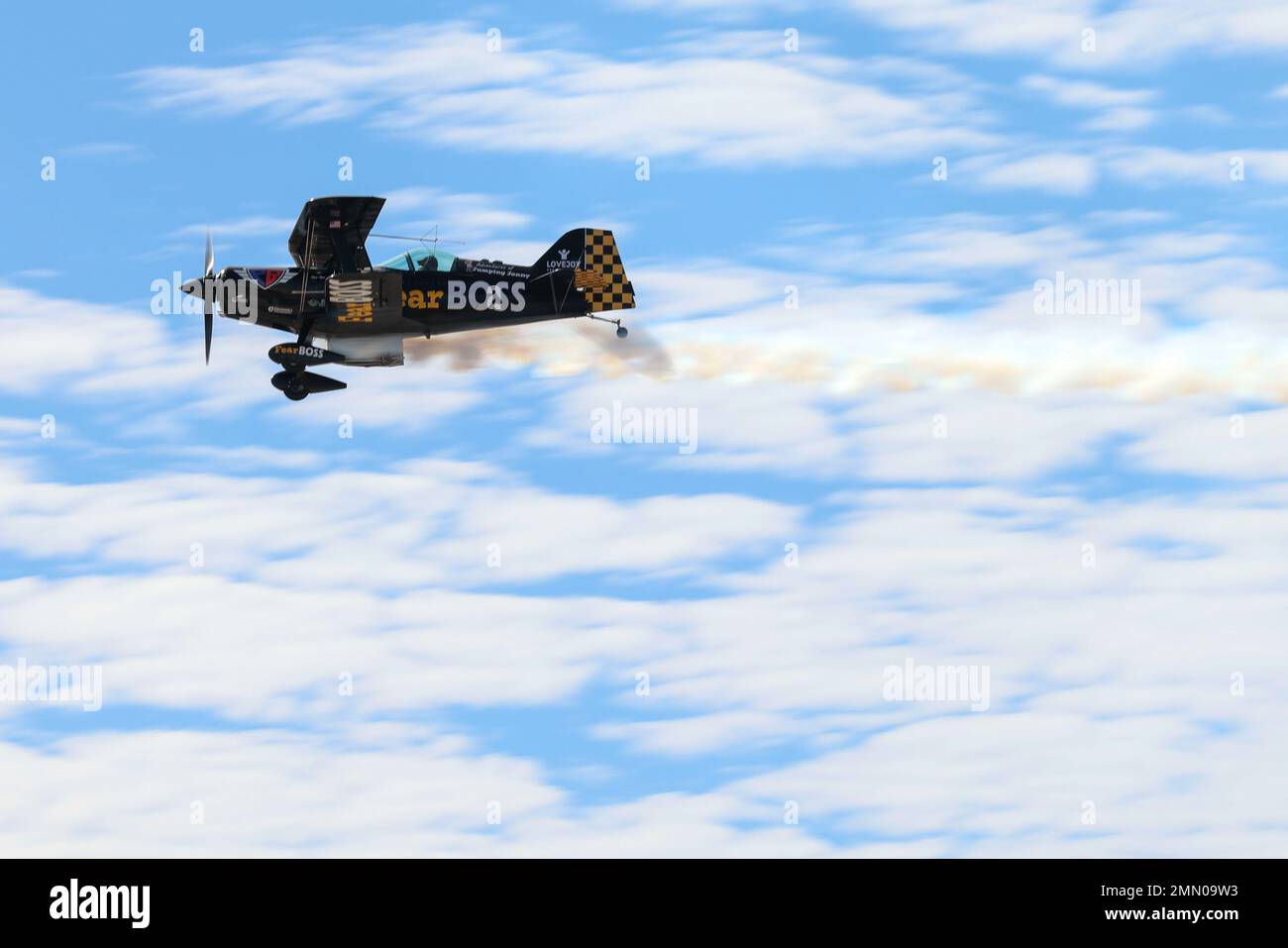 Jon Melby, piloting his Pitts S-1B Muscle Bi-Plane, performs aerobatics ...