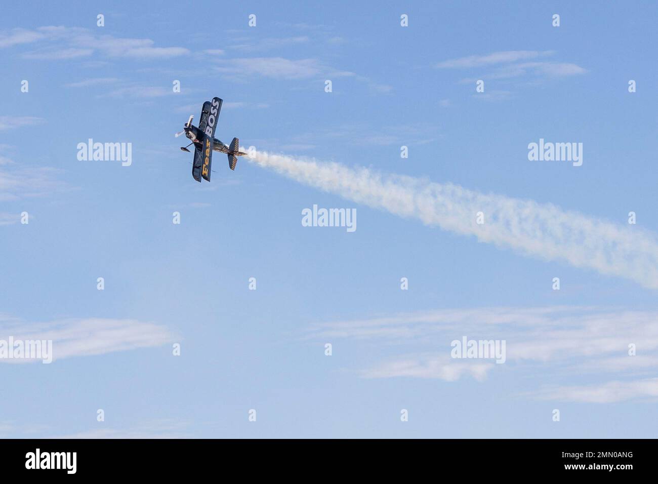 Jon Melby, piloting his Pitts S-1B Muscle Bi-Plane, performs aerobatics ...