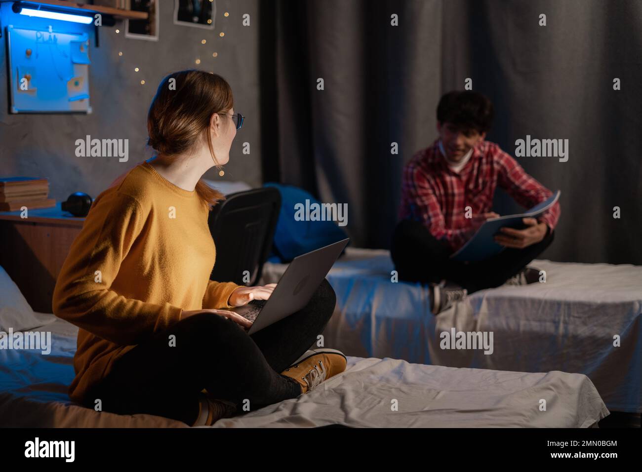 Students preparing for exams and doing homework in student hostel ...