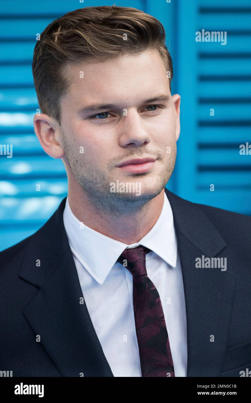 Jeremy Irvine poses for photographers upon arrival at the premiere of ...