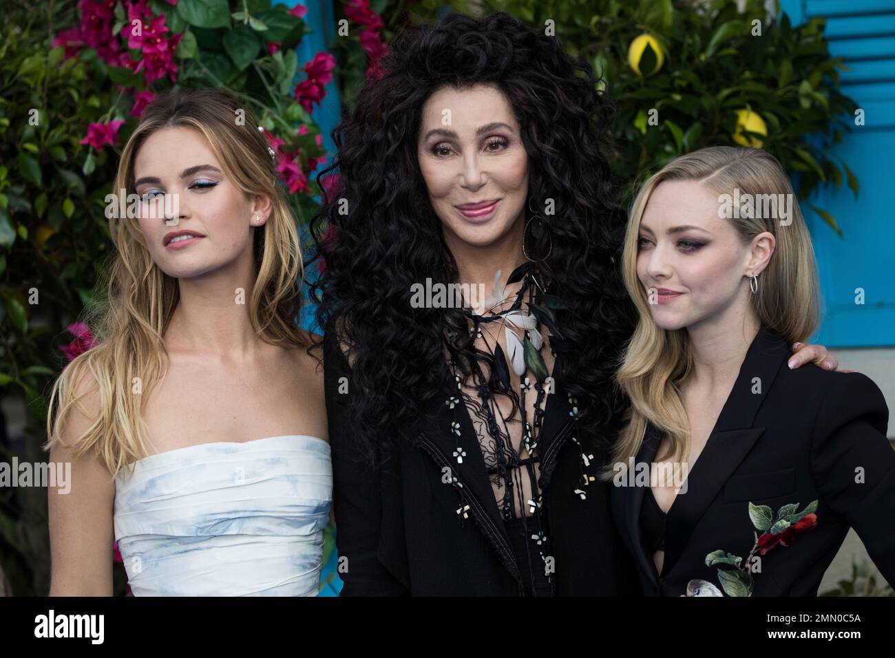 Lily James, Cher and Amanda Seyfried pose for photographers upon ...