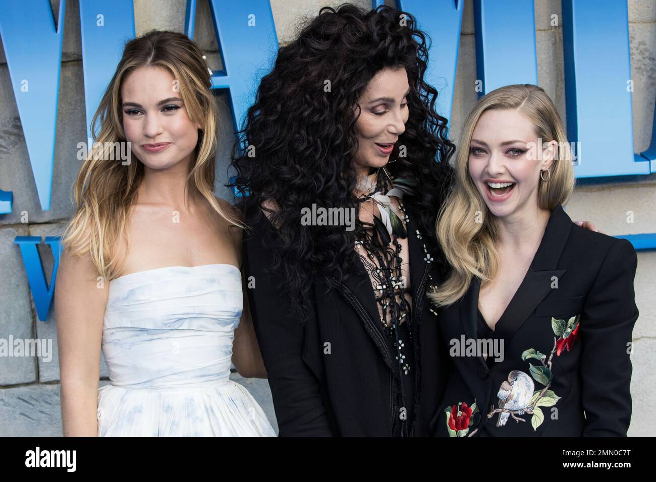 Lily James, Cher and Amanda Seyfried pose for photographers upon ...