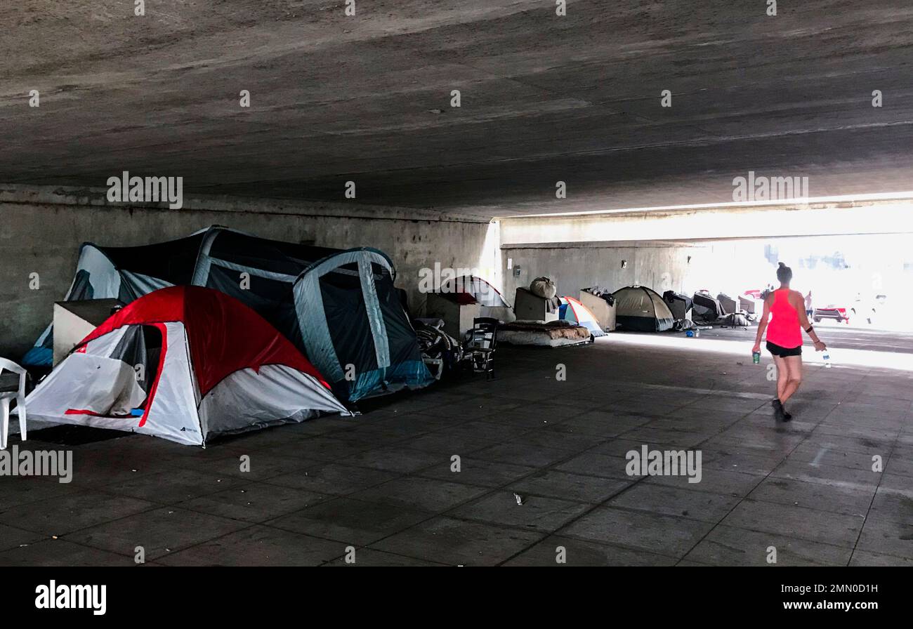 Several tents line an underpass in downtown Cincinnati on Monday, July ...