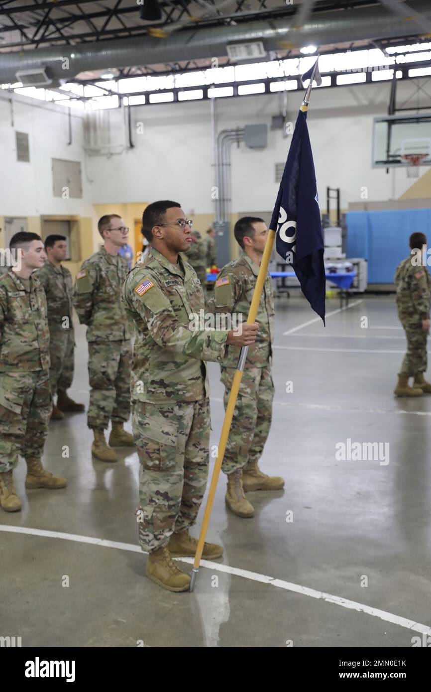 Sgt. Grant Browder holds the guide on for the 202nd Army Band during ...