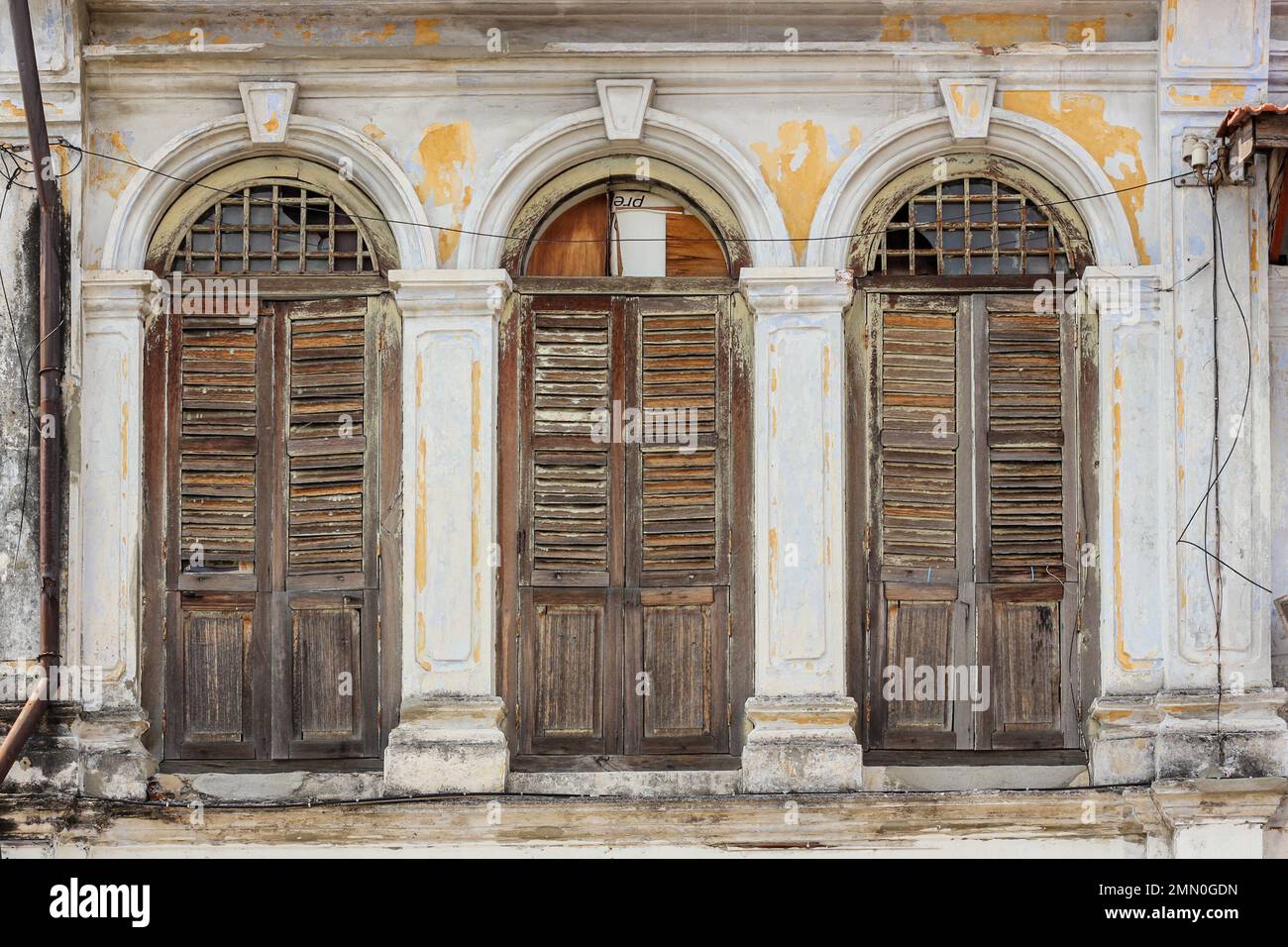 Beautiful ruined vintage wooden windows of an old Chinese shop house in ...