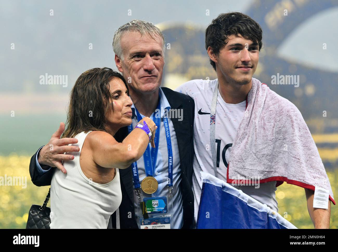 France head coach Didier Deschamps, center, celebrates with his son ...