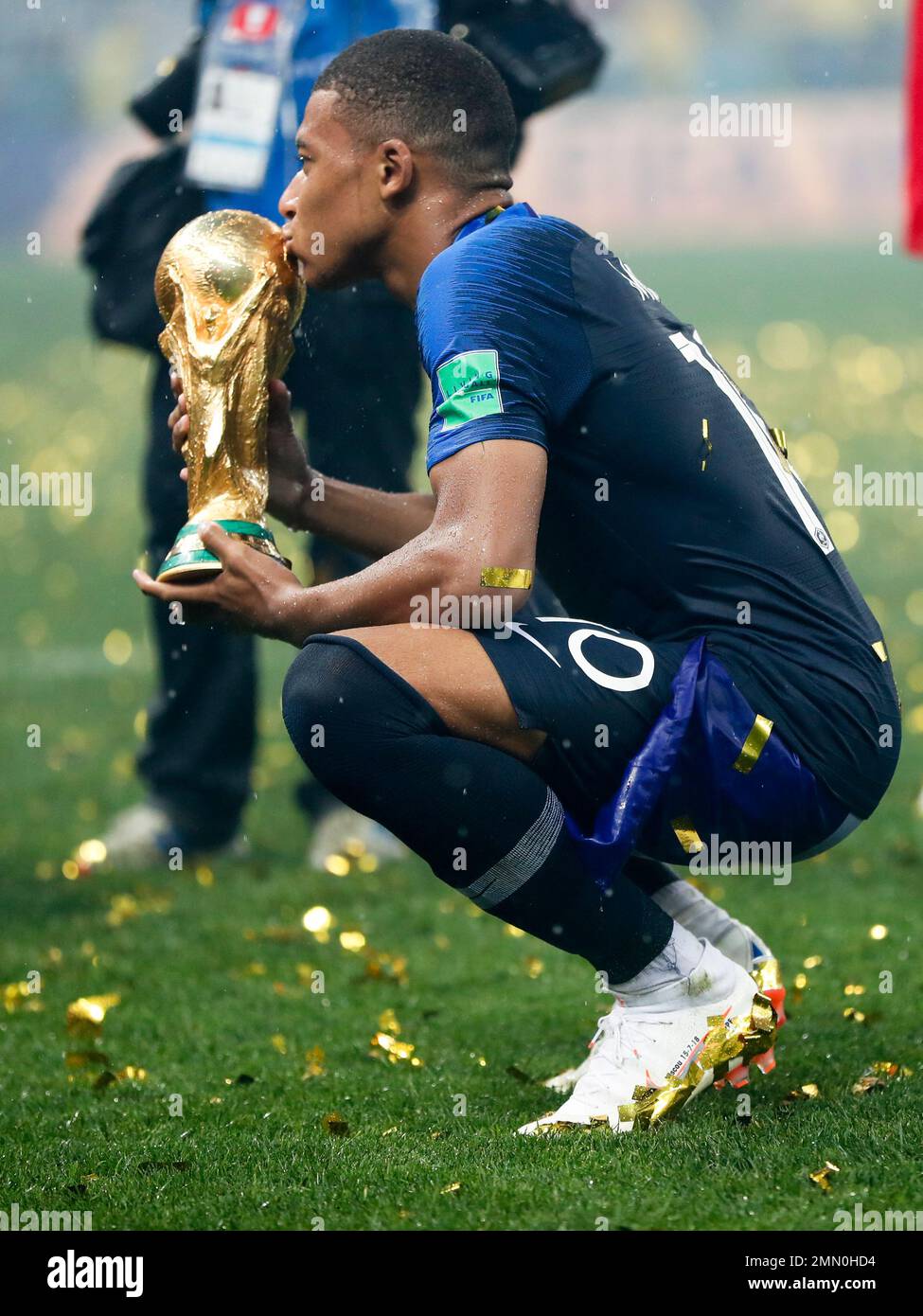 France's Kylian Mbappe kisses the trophy after the final match between ...