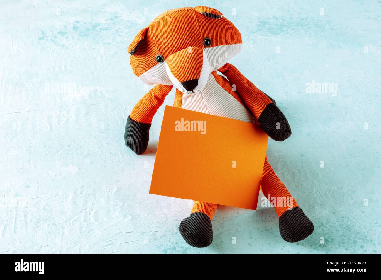 Mockup for a blank card with a toy fox. A greeting card or invitation ...
