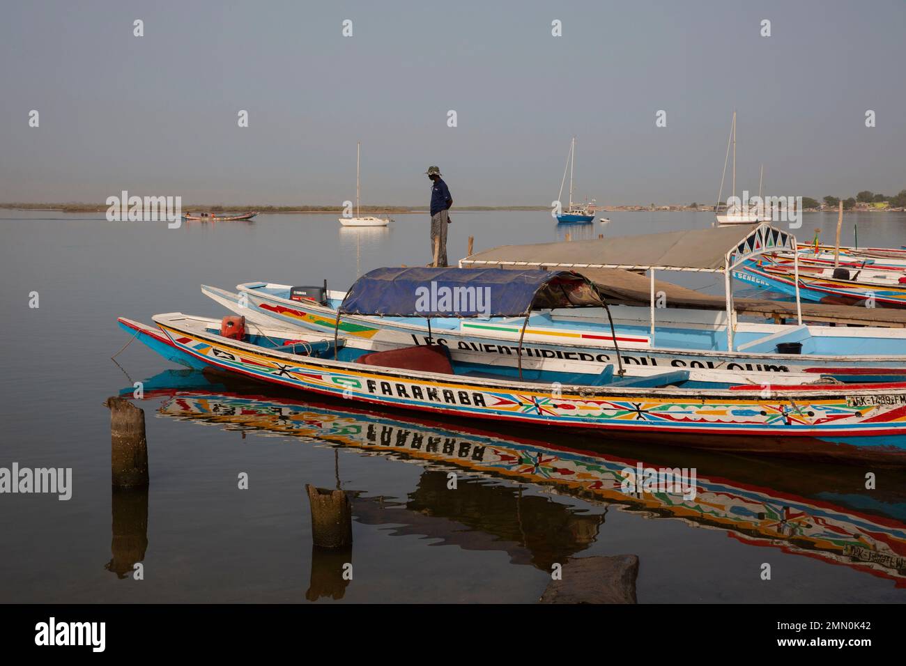 Senegal, Saloum delta listed as World Heritage by UNESCO, man in the ...