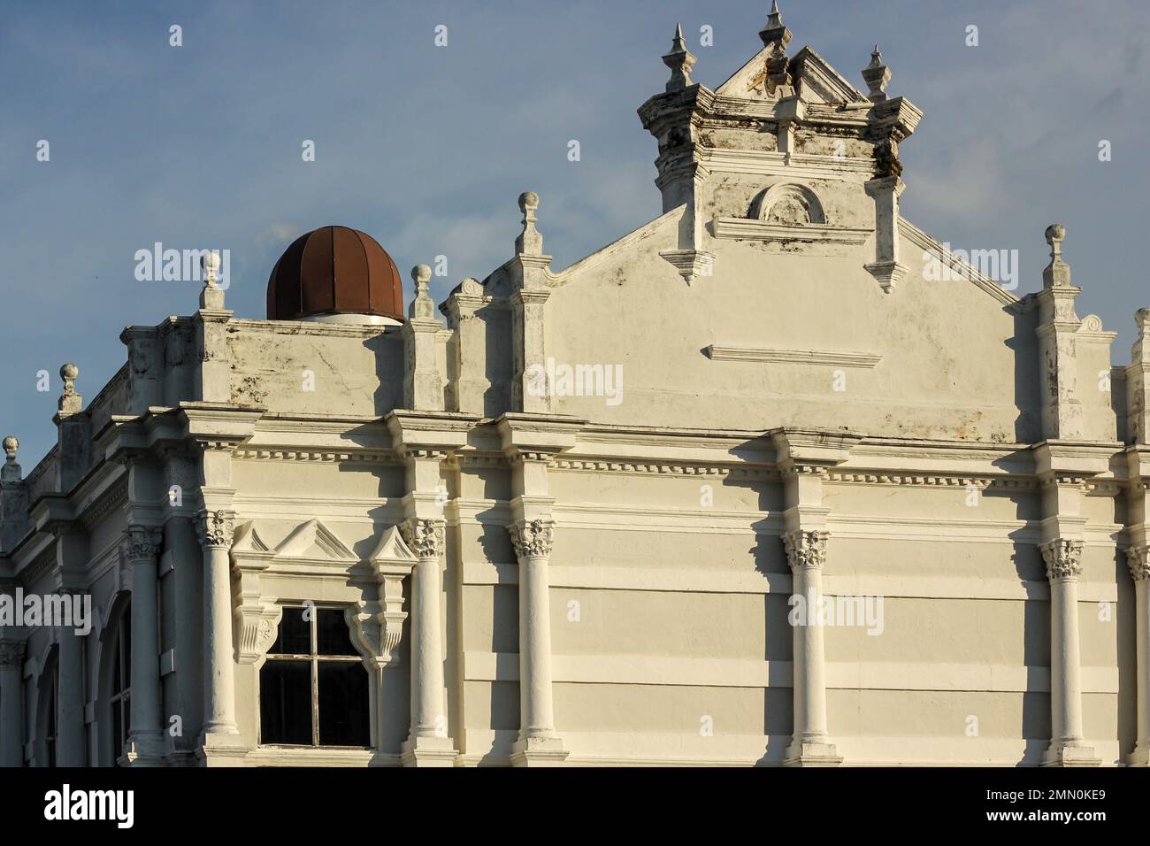 Exterior facade of an old colonial era church with gothic windows in ...