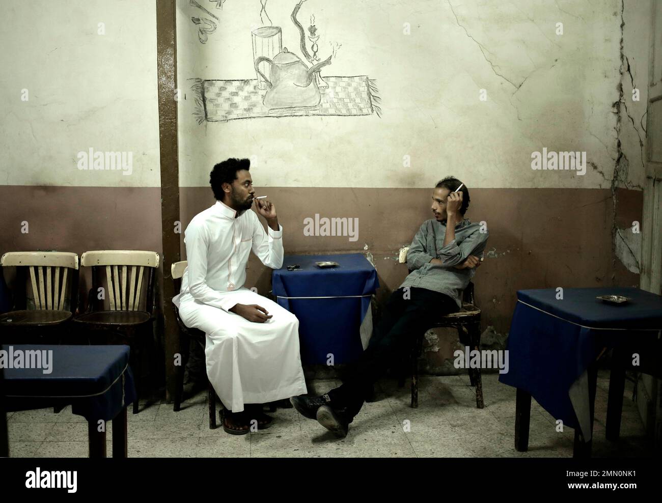 In this May 10, 2018, photo, 30-year old Nubian activist Mazen Alaa from the Fajeky tribe, left ...